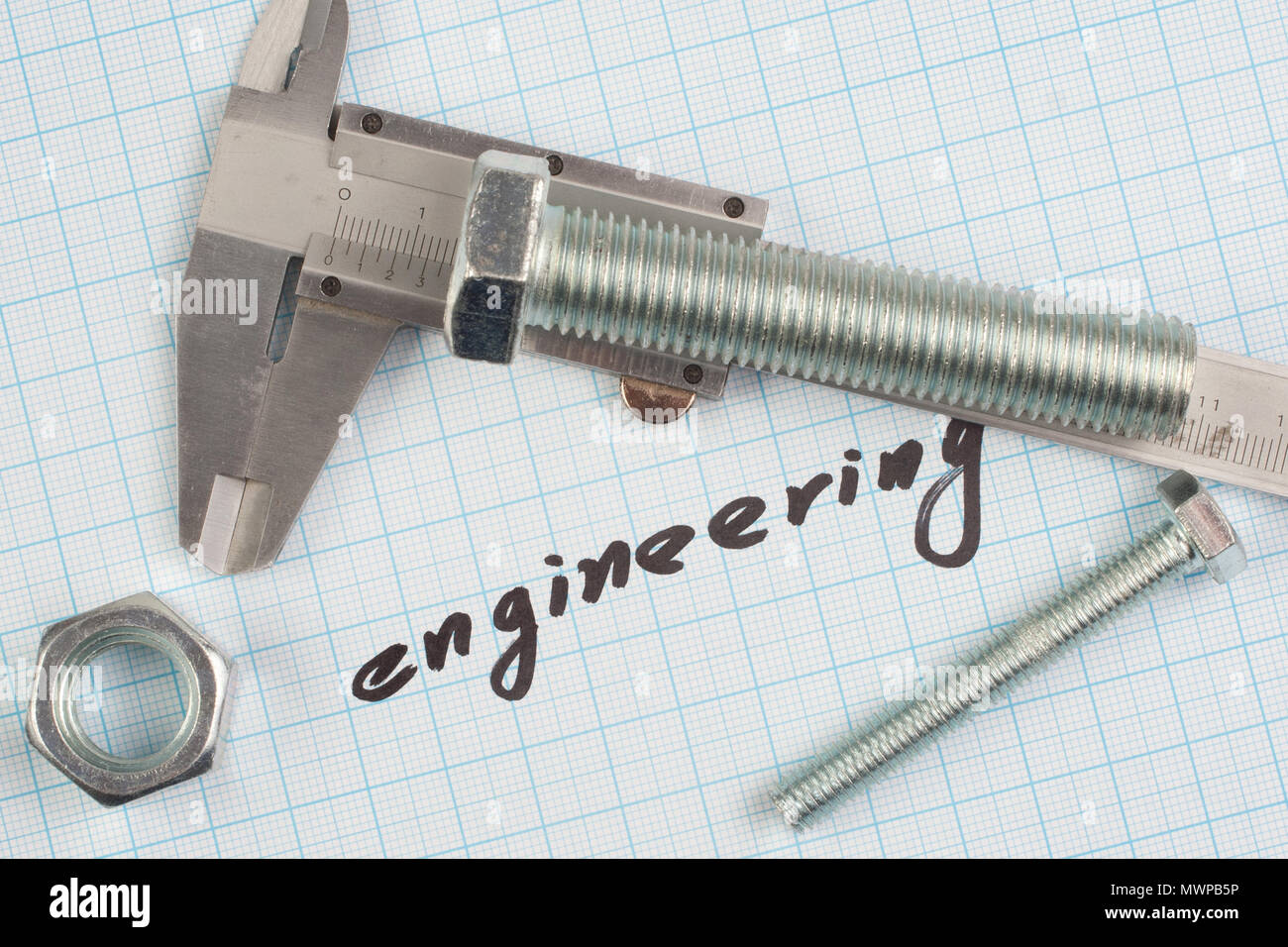 "engineering" - Screw and Nuts on graph paper background Stock Photo ...