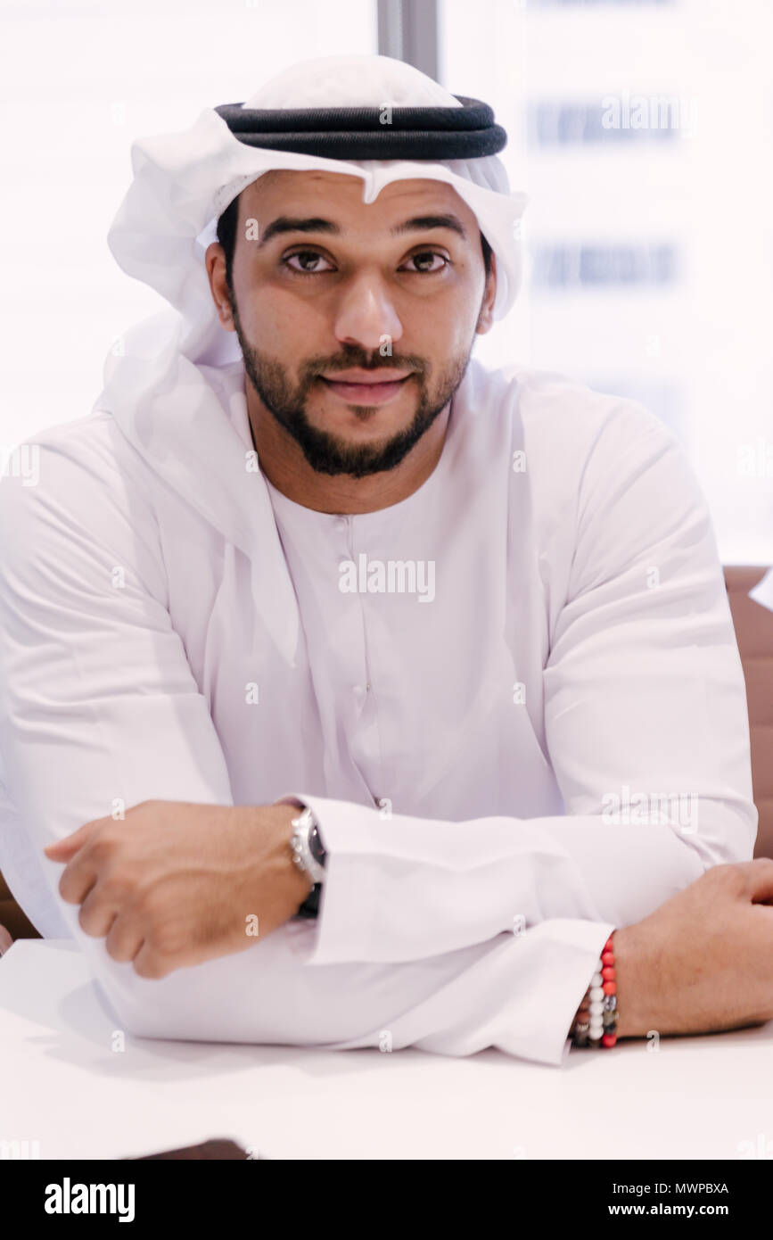Emirati businessman looking at camera Stock Photo - Alamy