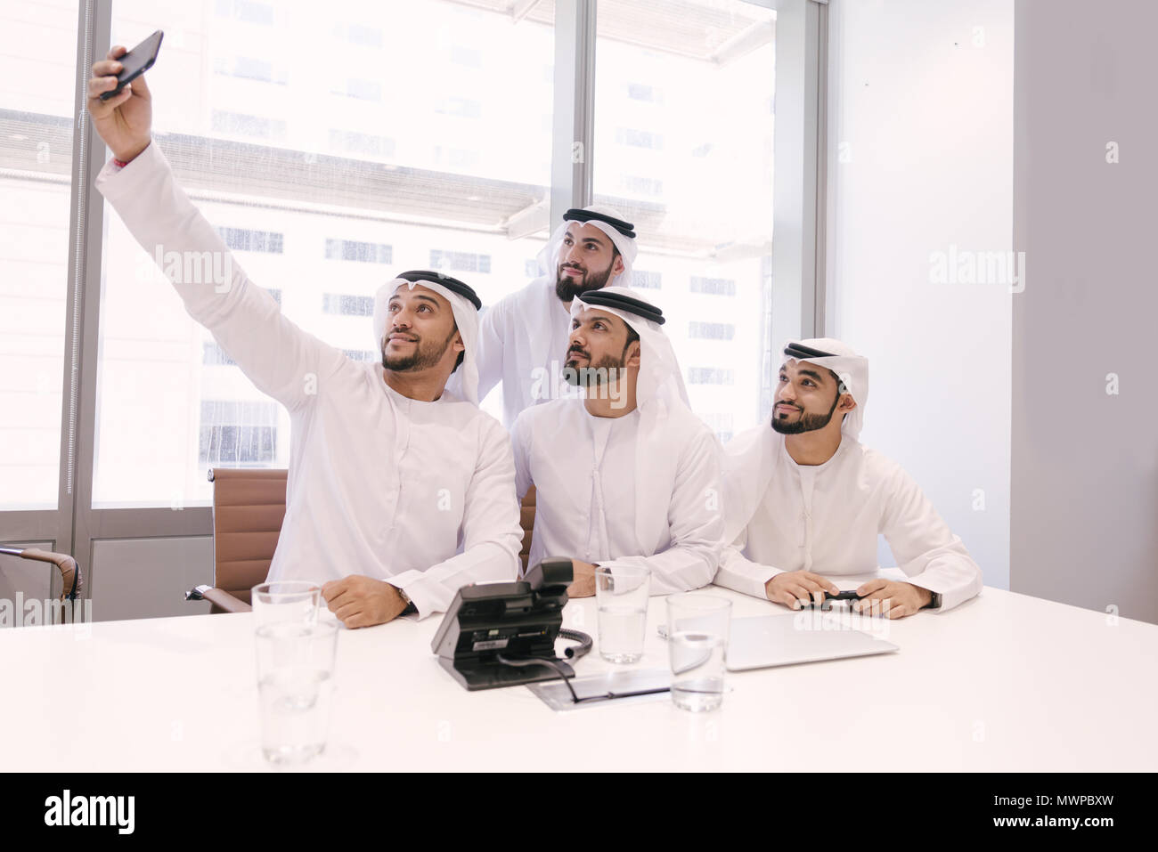 Arabian men meeting and talking about business - Businessmen portrait ...