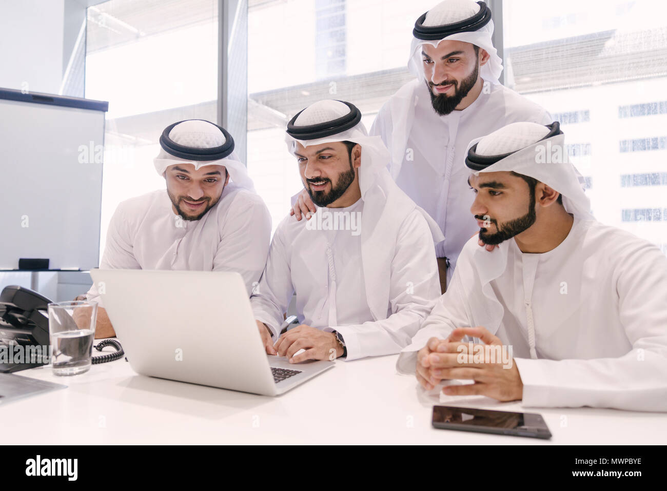 Arabian men meeting and talking about business - Businessmen portrait ...