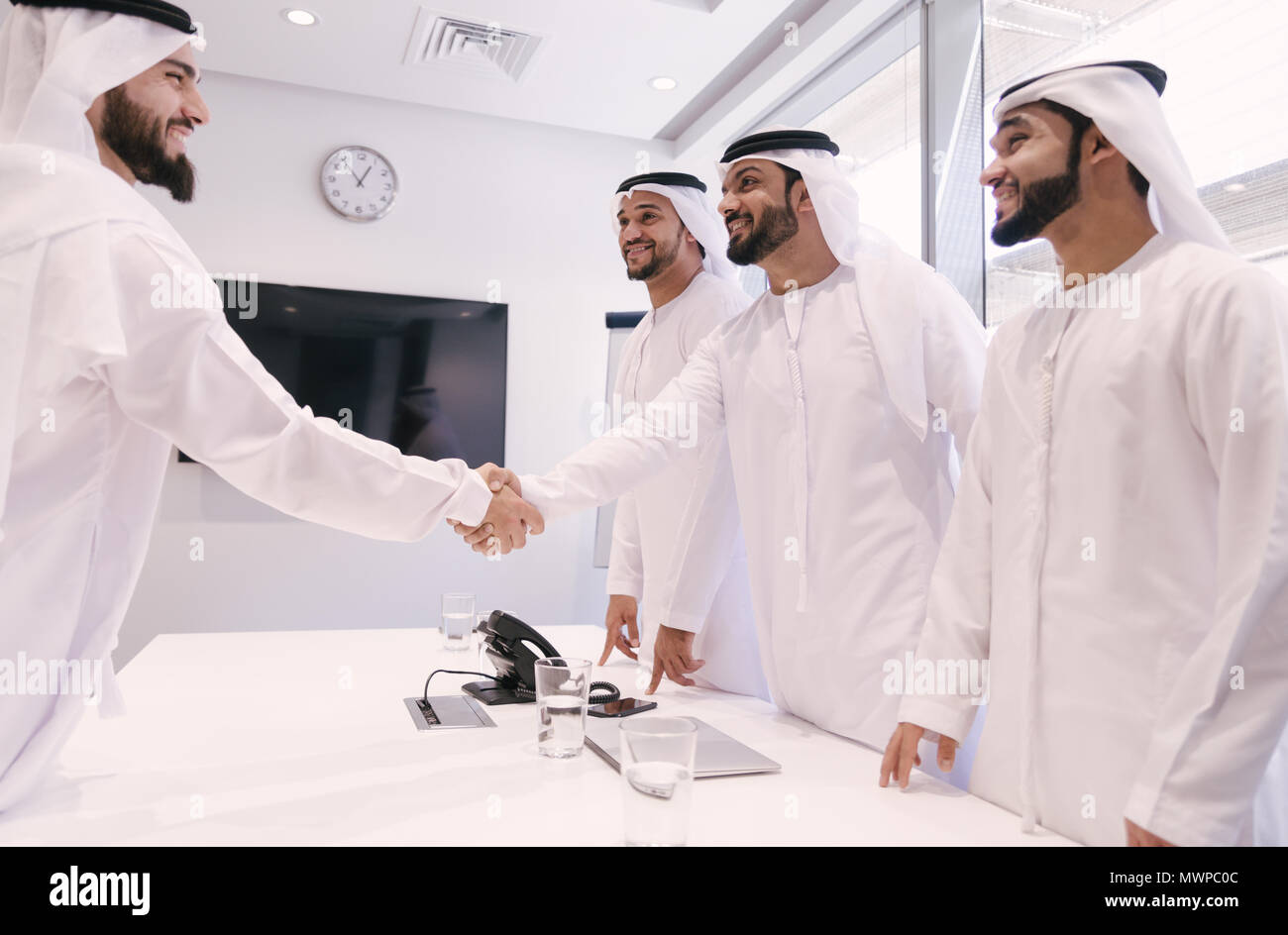 Arabian men meeting and talking about business - Businessmen portrait ...