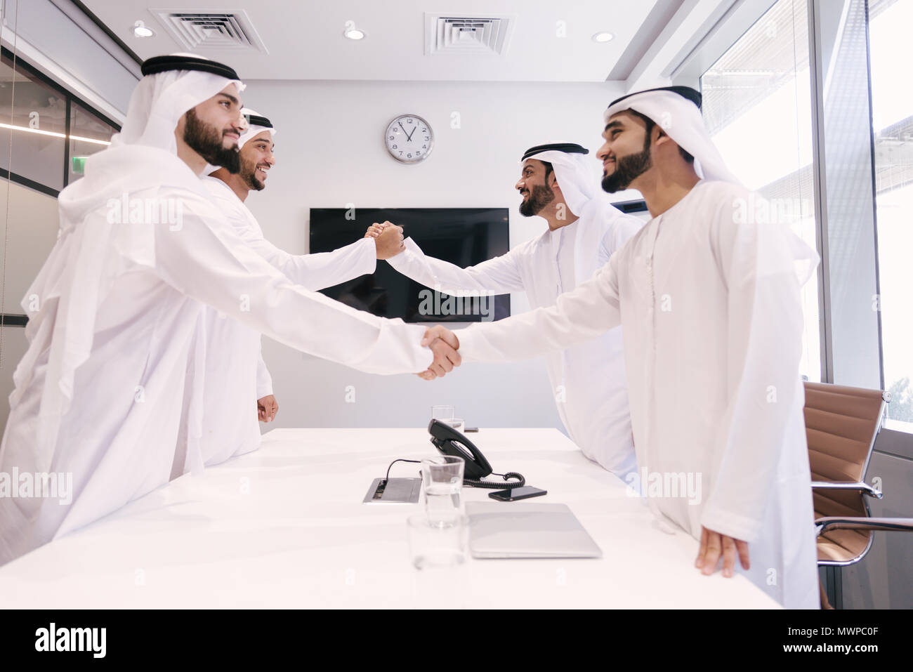 Arabian men meeting and talking about business - Businessmen portrait ...