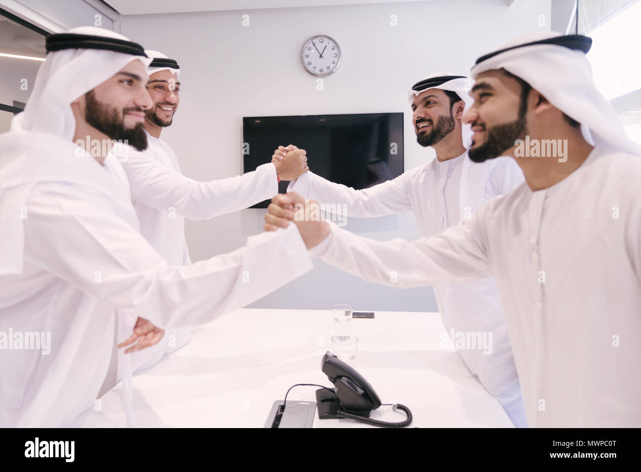 Arabian men meeting and talking about business - Businessmen portrait ...