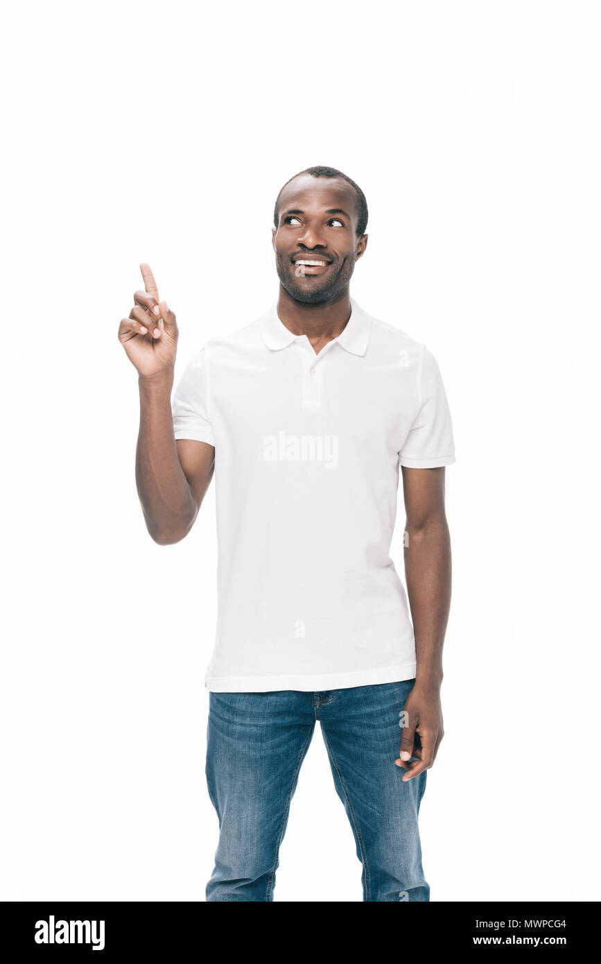 handsome young african american man pointing up with finger isolated on ...