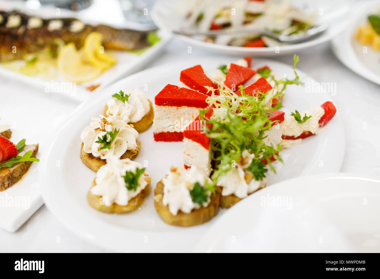 Catering table set service with silverware and glass stemware at ...