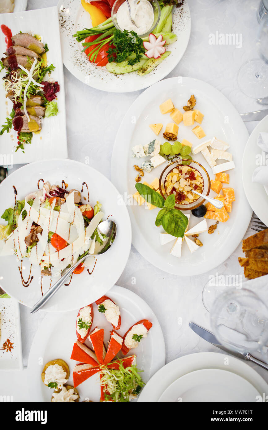 delicious dishes on the table in the restaurant. serving table Stock ...