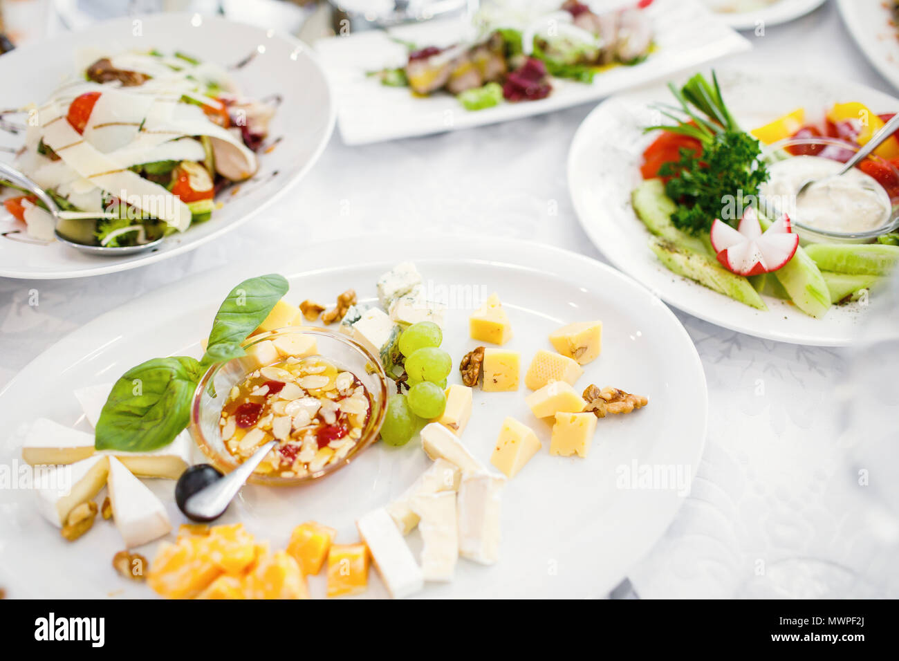 Catering table set service with silverware and glass stemware at ...