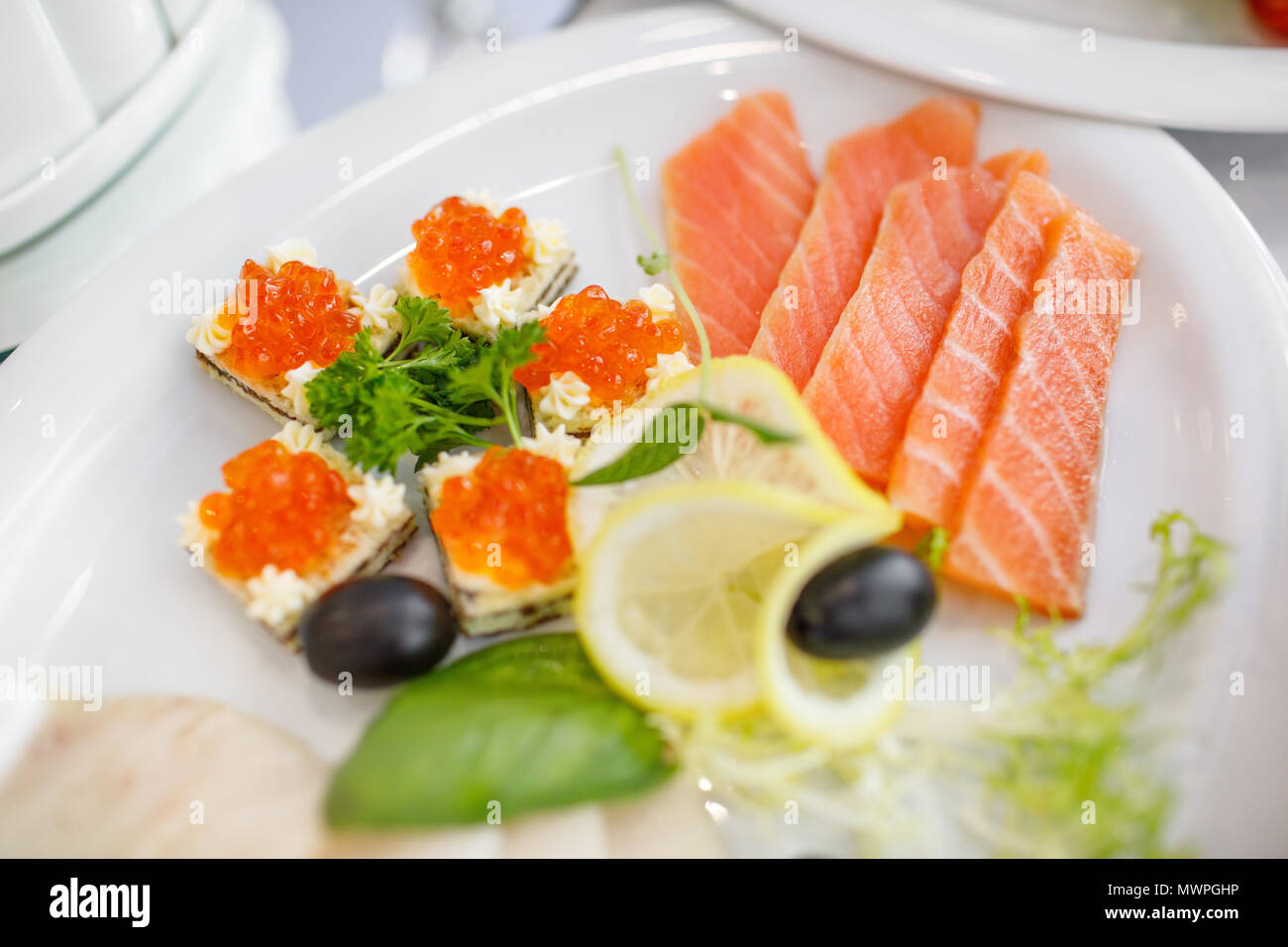 Catering table set service with silverware and glass stemware at ...