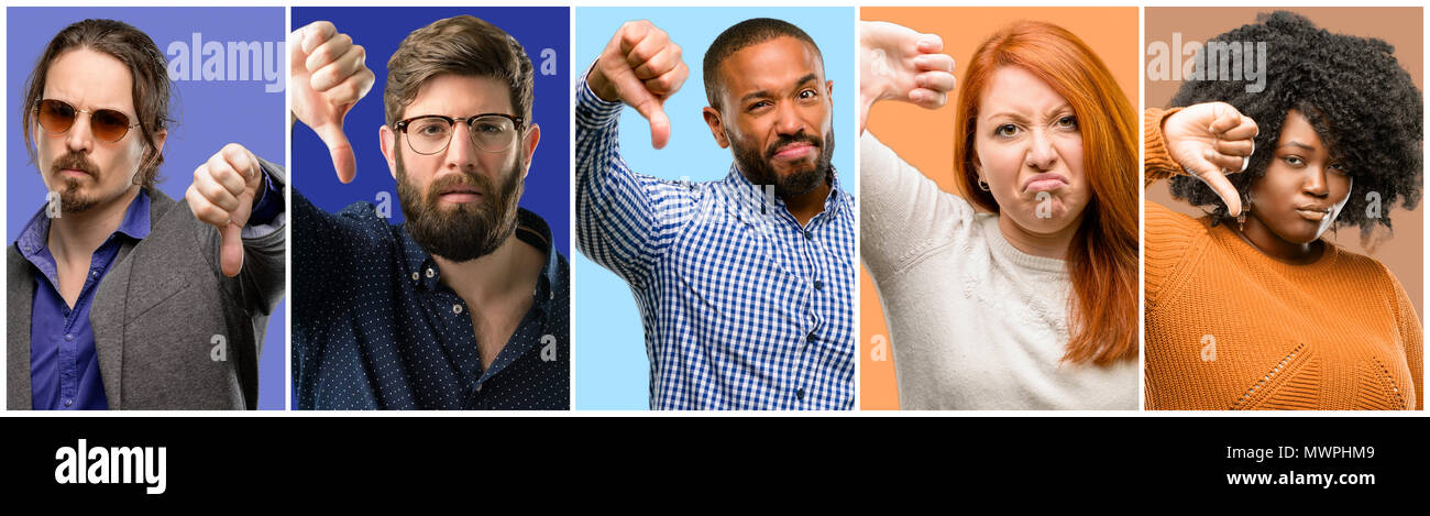 Group of cool people, woman and man showing thumbs down unhappy sign of ...