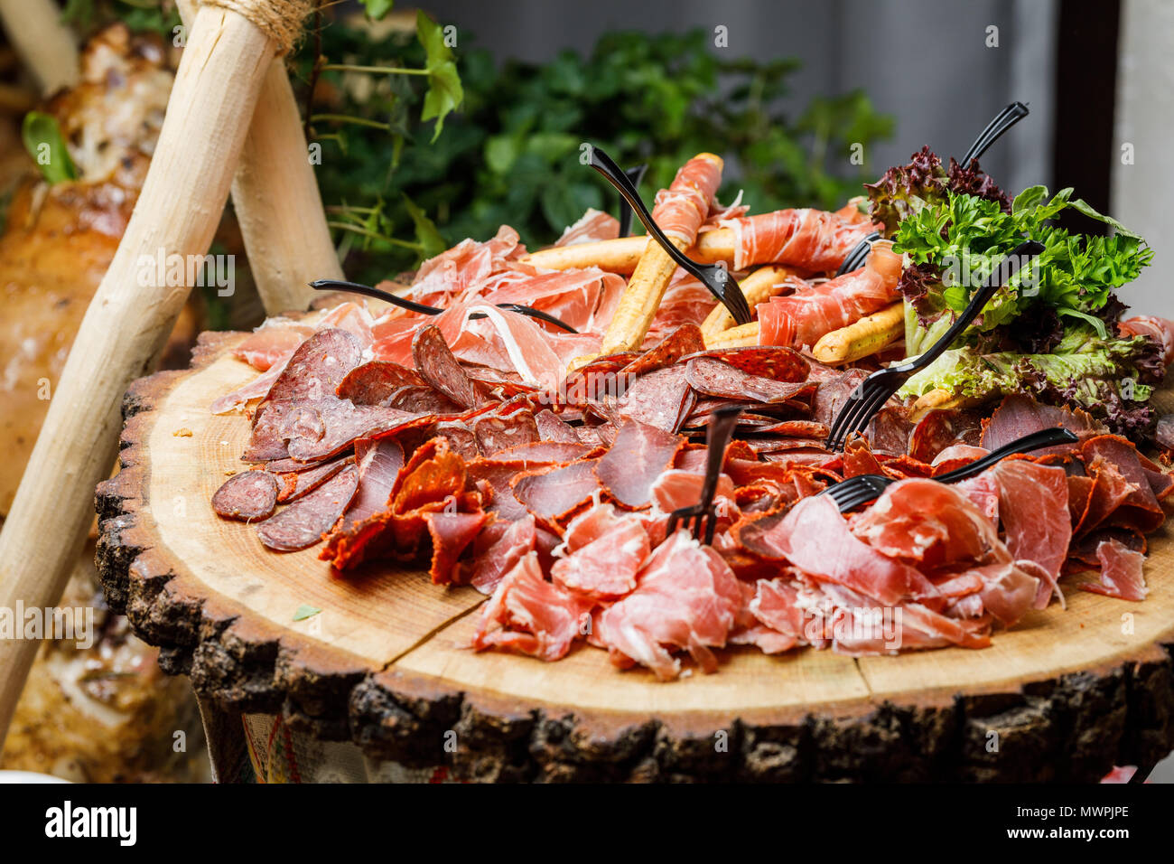 table with different type of snacks preparing for party Stock Photo - Alamy