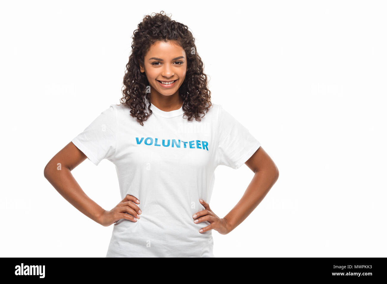 female african american volunteer with arms akimbo isolated on white ...