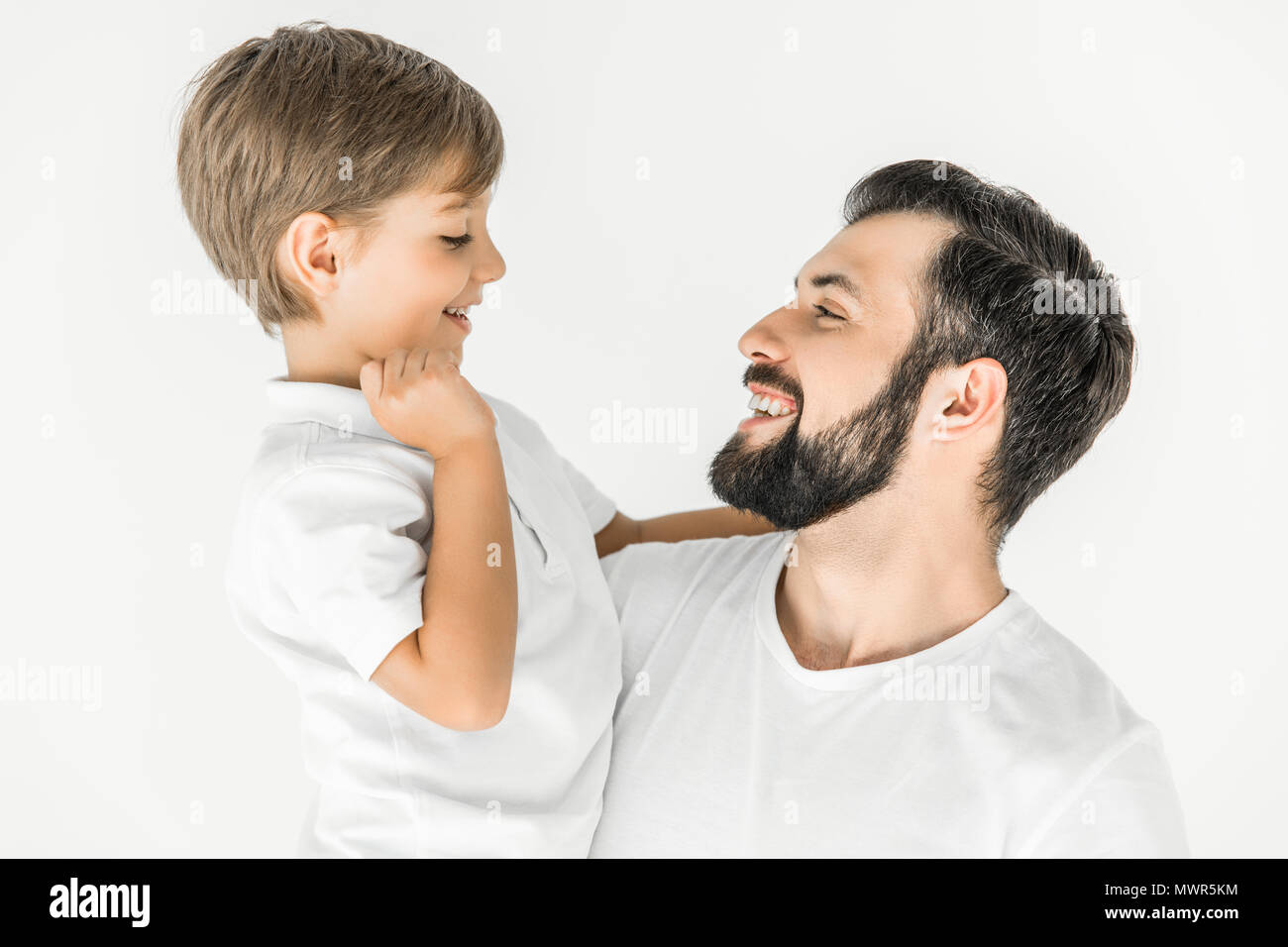 happy father and son smiling each other isolated on white Stock Photo ...