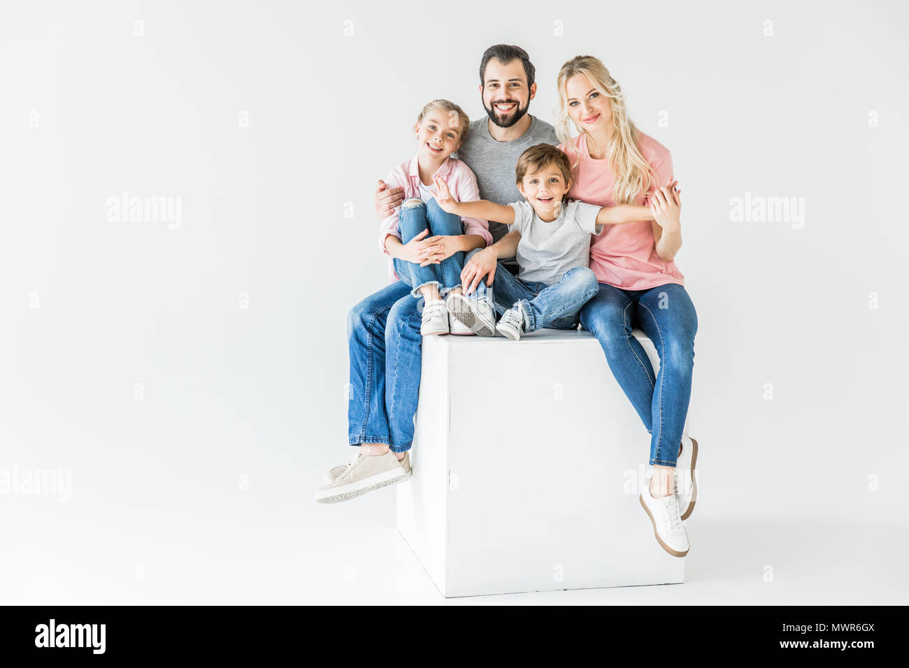 Two kids sit isolated hi-res stock photography and images - Alamy
