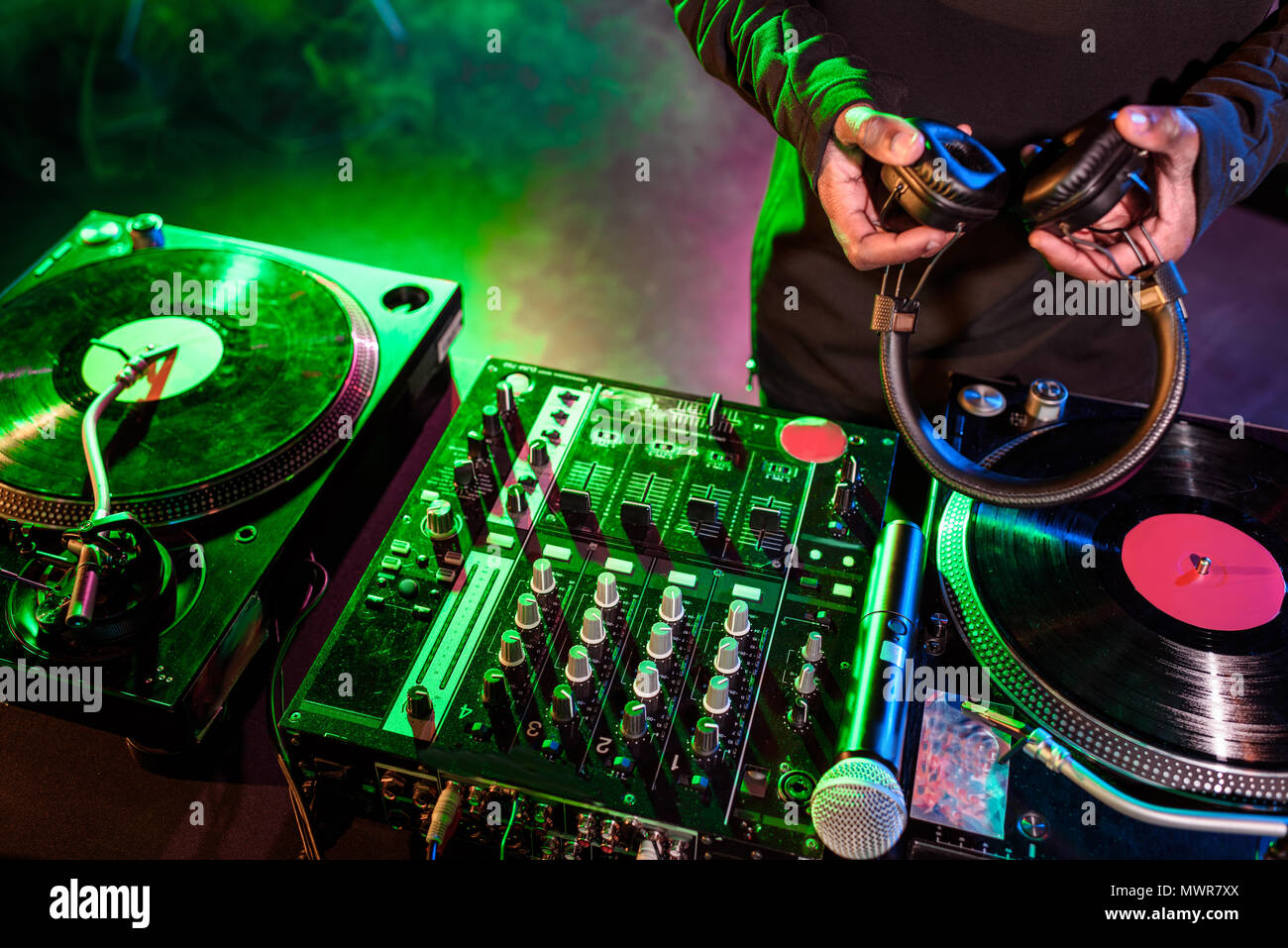 Hands Holding Headphones High Resolution Stock Photography and Images ...