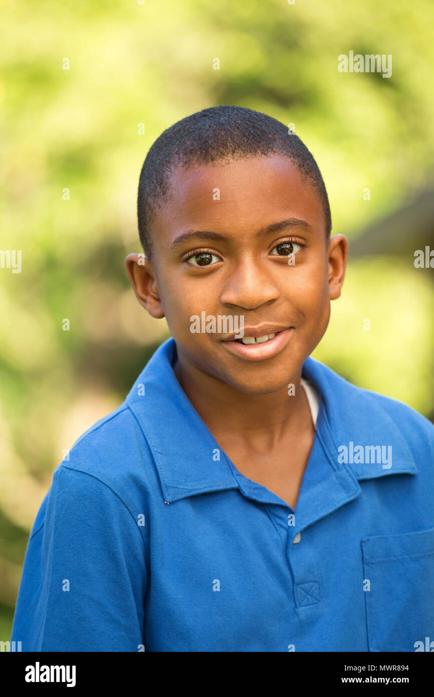 African American young boy smiling Stock Photo - Alamy