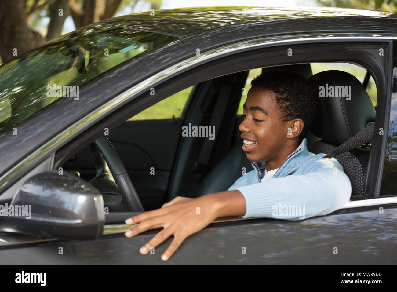 Father teaching his son how to drive Stock Photo - Alamy