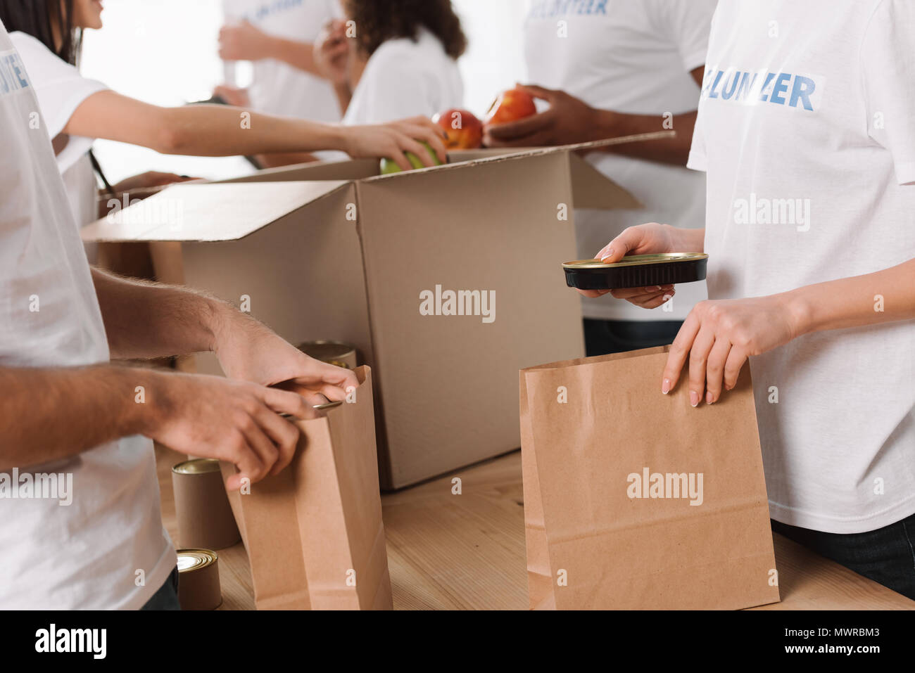 Volunteers packing hi-res stock photography and images - Alamy