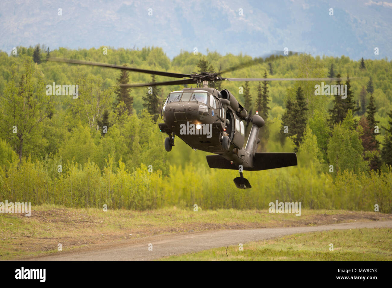 An Alaska Army National Guard UH-60 Black Hawk helicopter approaches ...