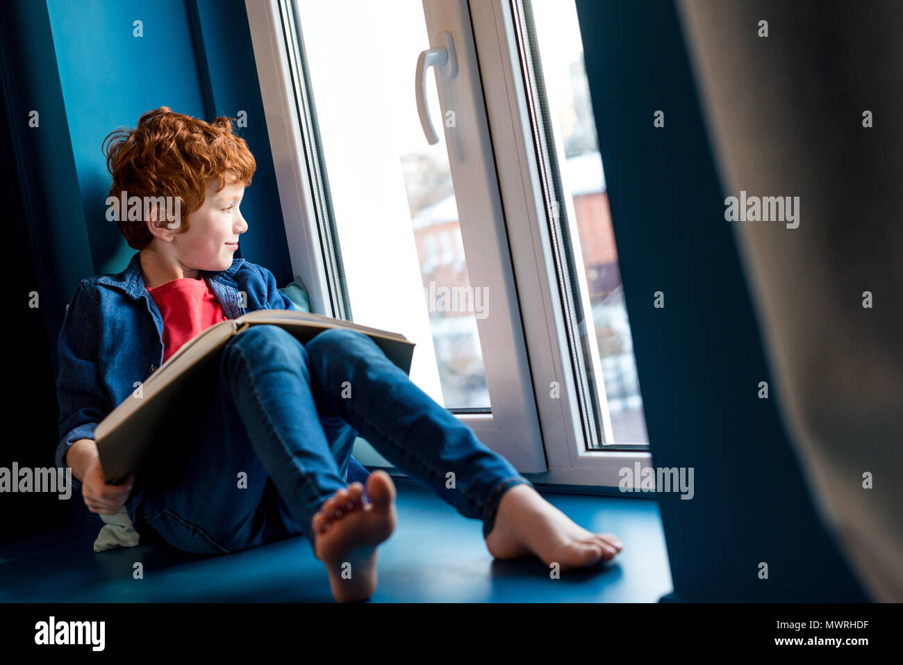 Barefoot book boy caucasian hi-res stock photography and images - Alamy