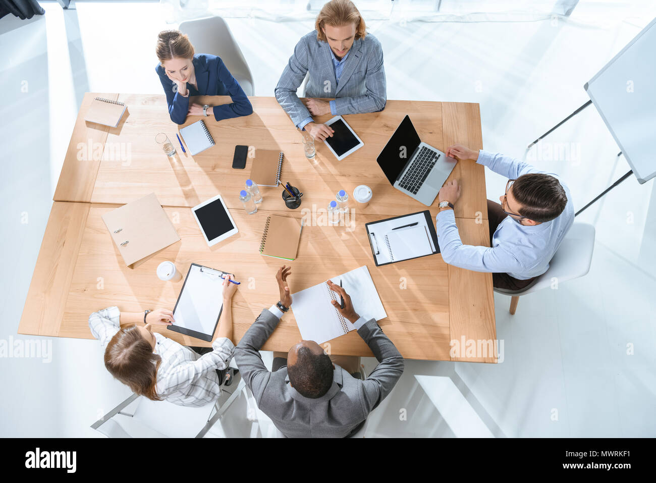 business team working while siting at table at office space Stock Photo ...