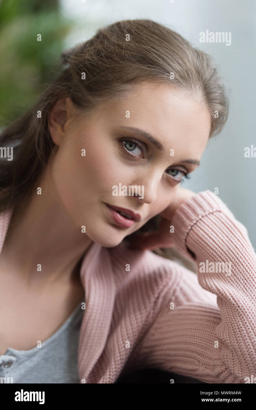 Leaning on hand hi-res stock photography and images - Alamy