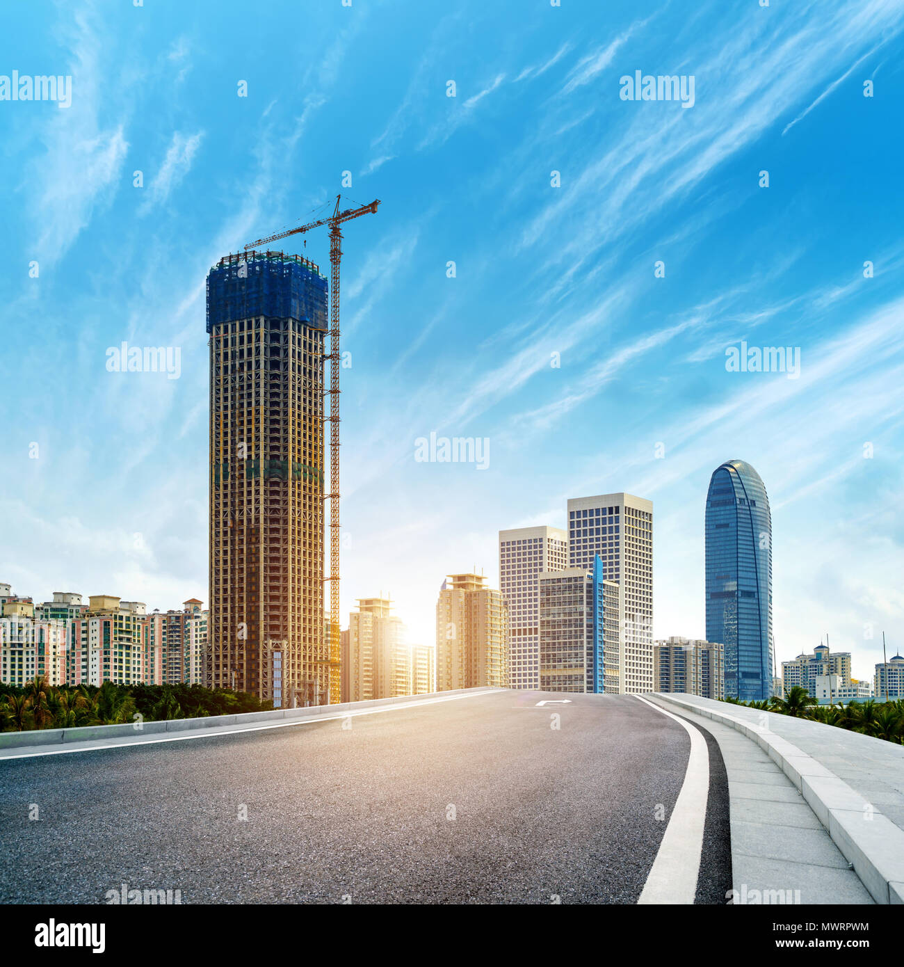 Clean highways, high-rise building construction sites and cranes Stock ...