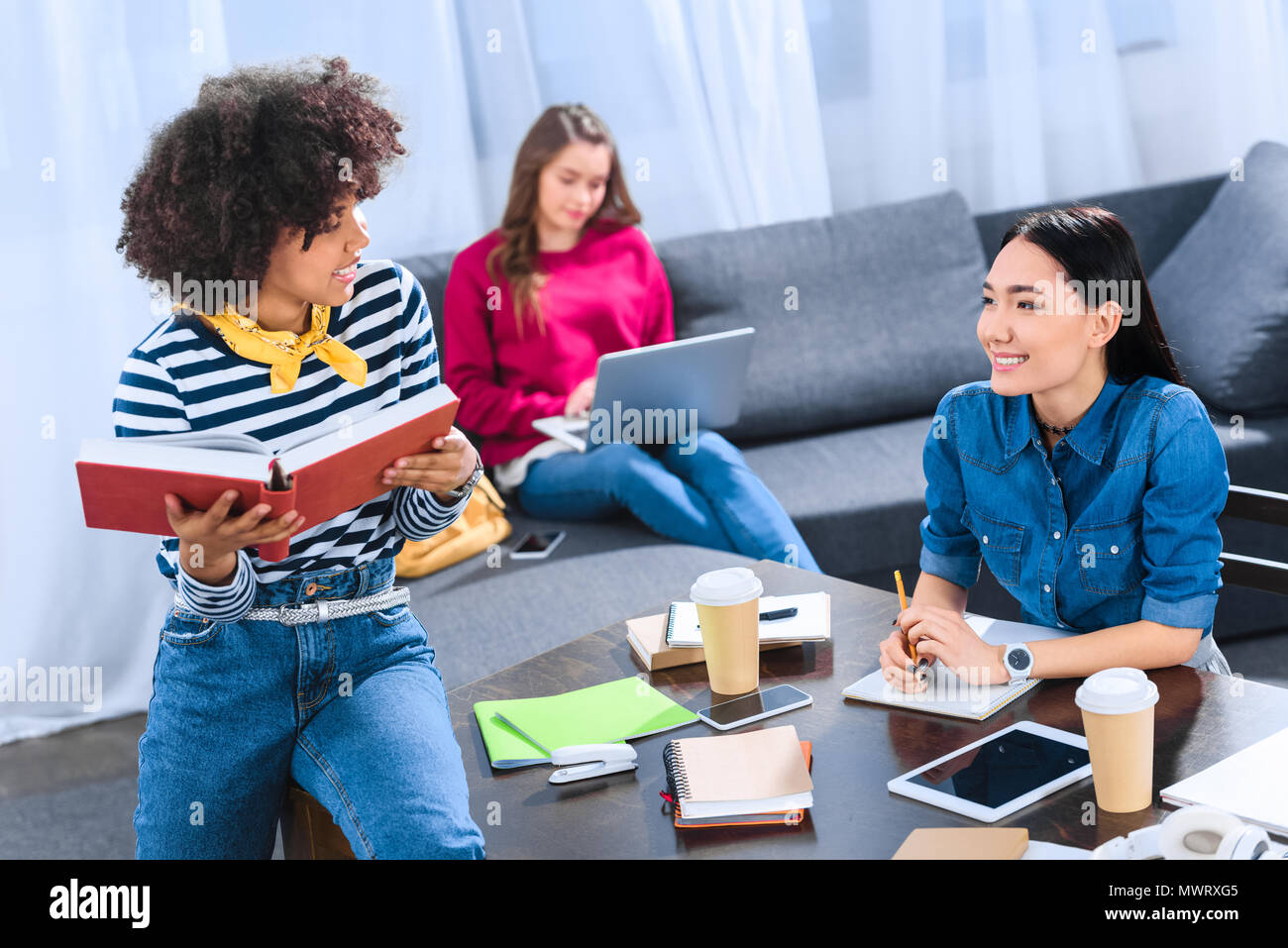 multicultural group of young students studying together Stock Photo - Alamy