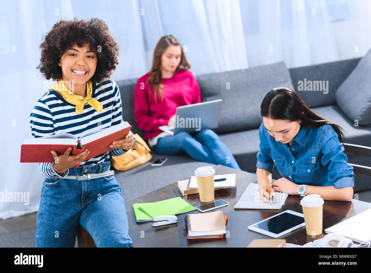 multicultural group of young students studying together Stock Photo - Alamy