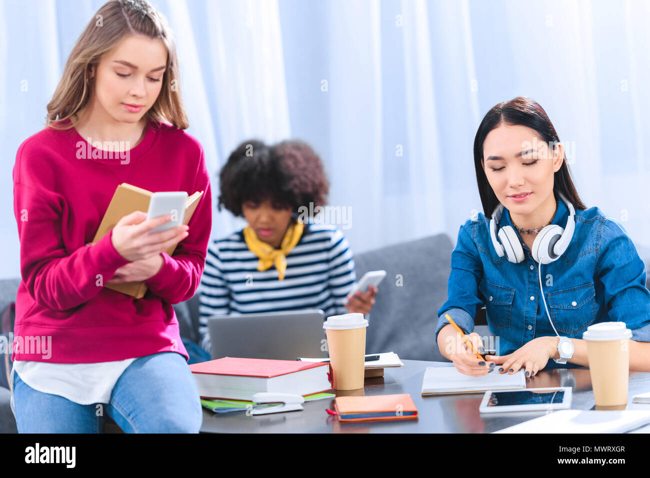 multicultural group of young students studying together Stock Photo - Alamy