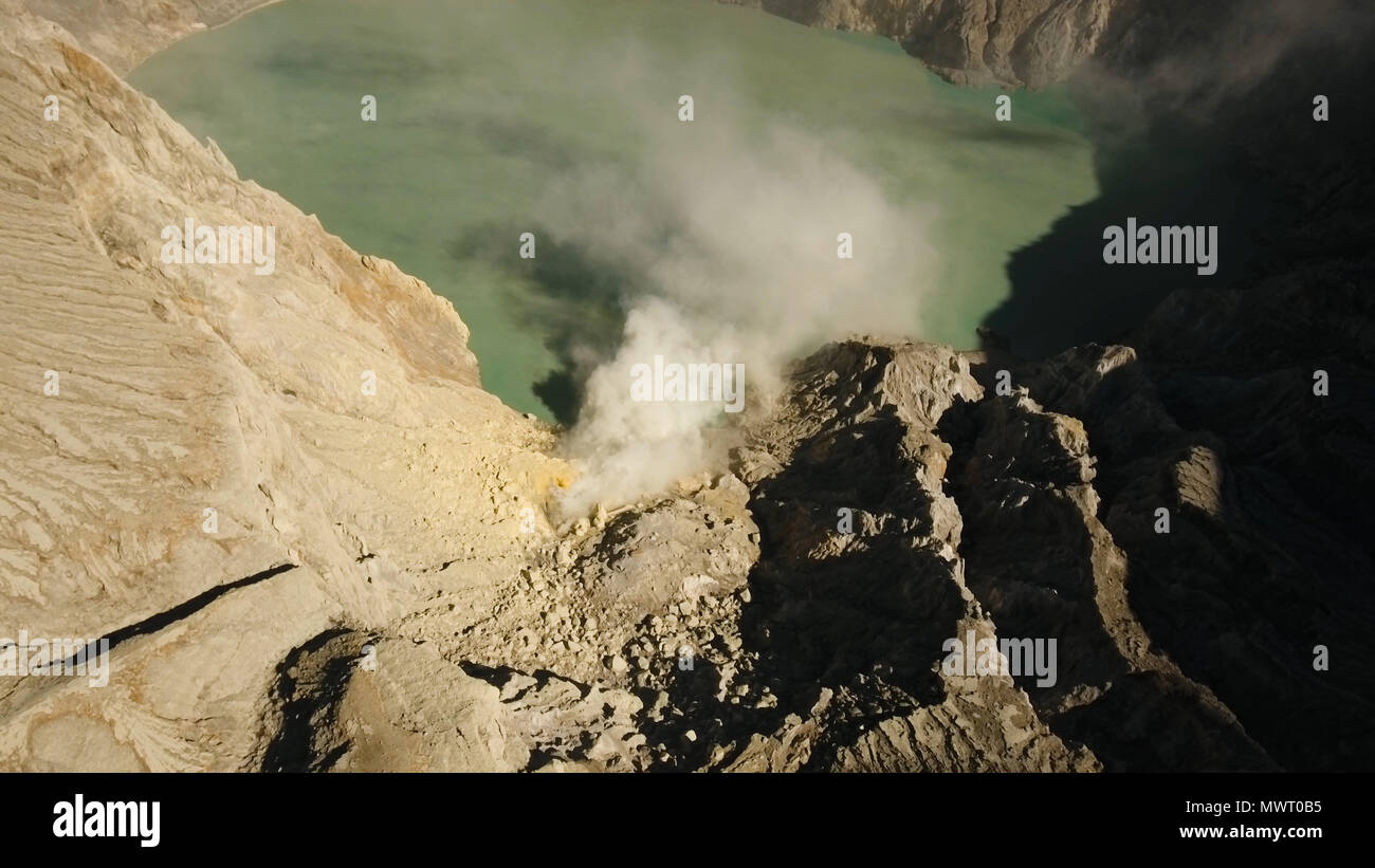 Crater with acidic crater lake, Kawah Ijen the famous tourist ...