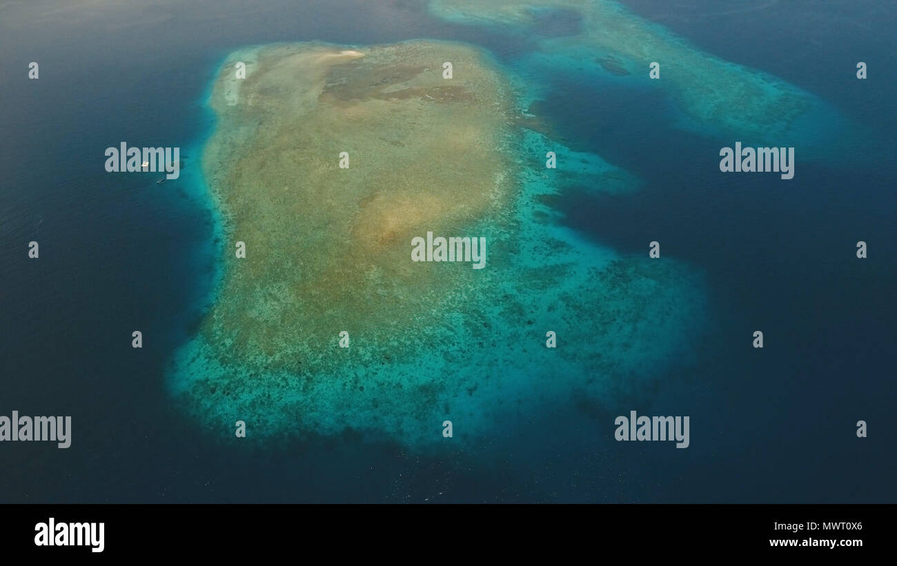 Aerial view coral reef, atoll with turquoise water in the sea.Tropical ...
