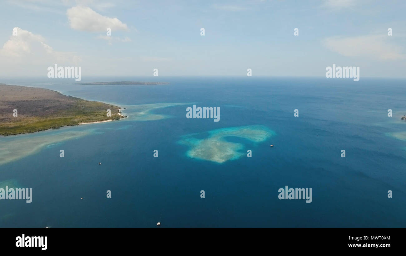 Aerial view coral reef, atoll with turquoise water in the sea.Tropical ...