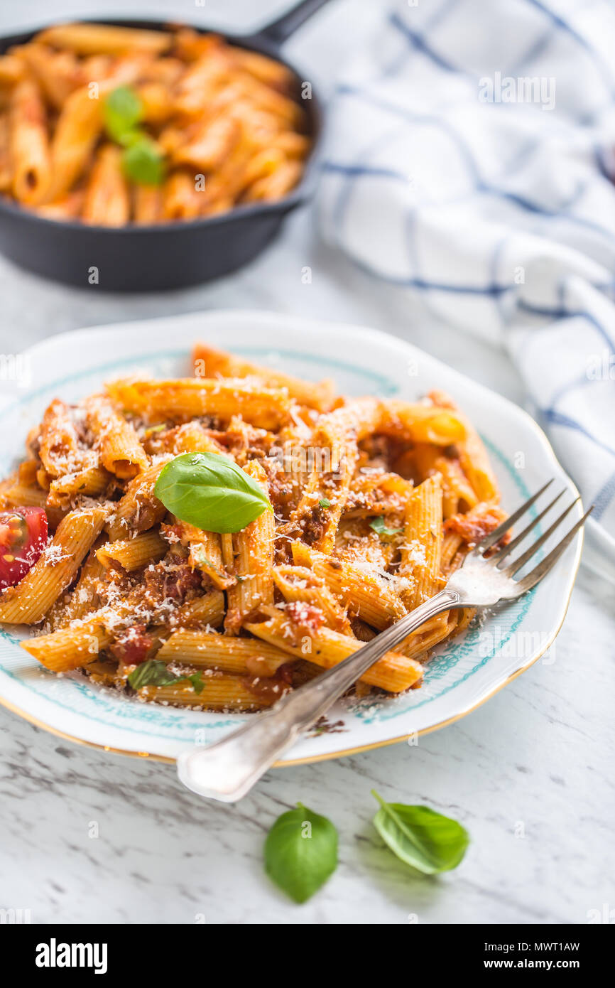 Italian food and pasta pene with bolognese sause on plate Stock Photo ...
