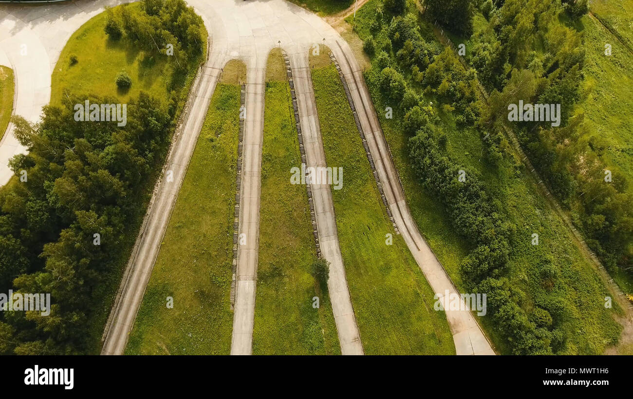 Aerial view Road for a drive test drive, climb up the slope. Simulation ...