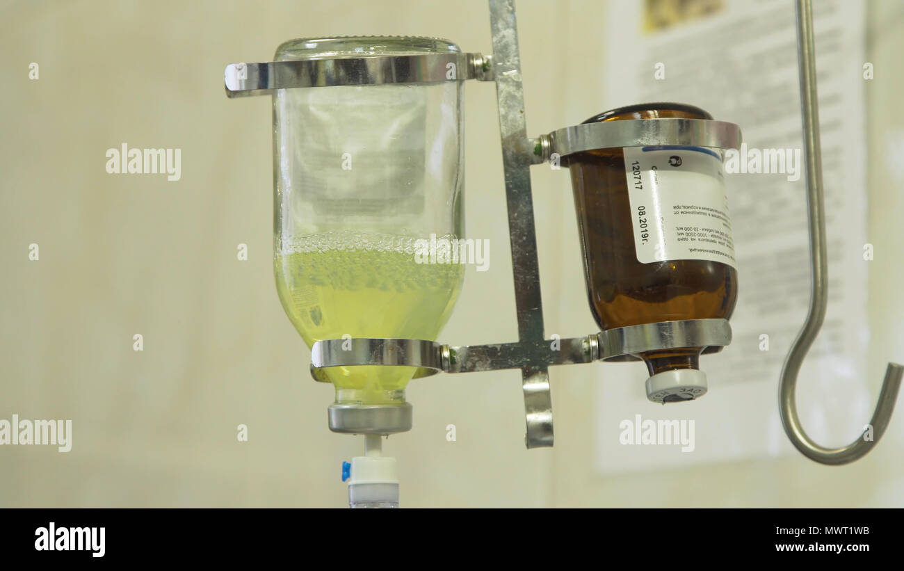 Dropper for intravenous injection. Apparatus and valve control for ...