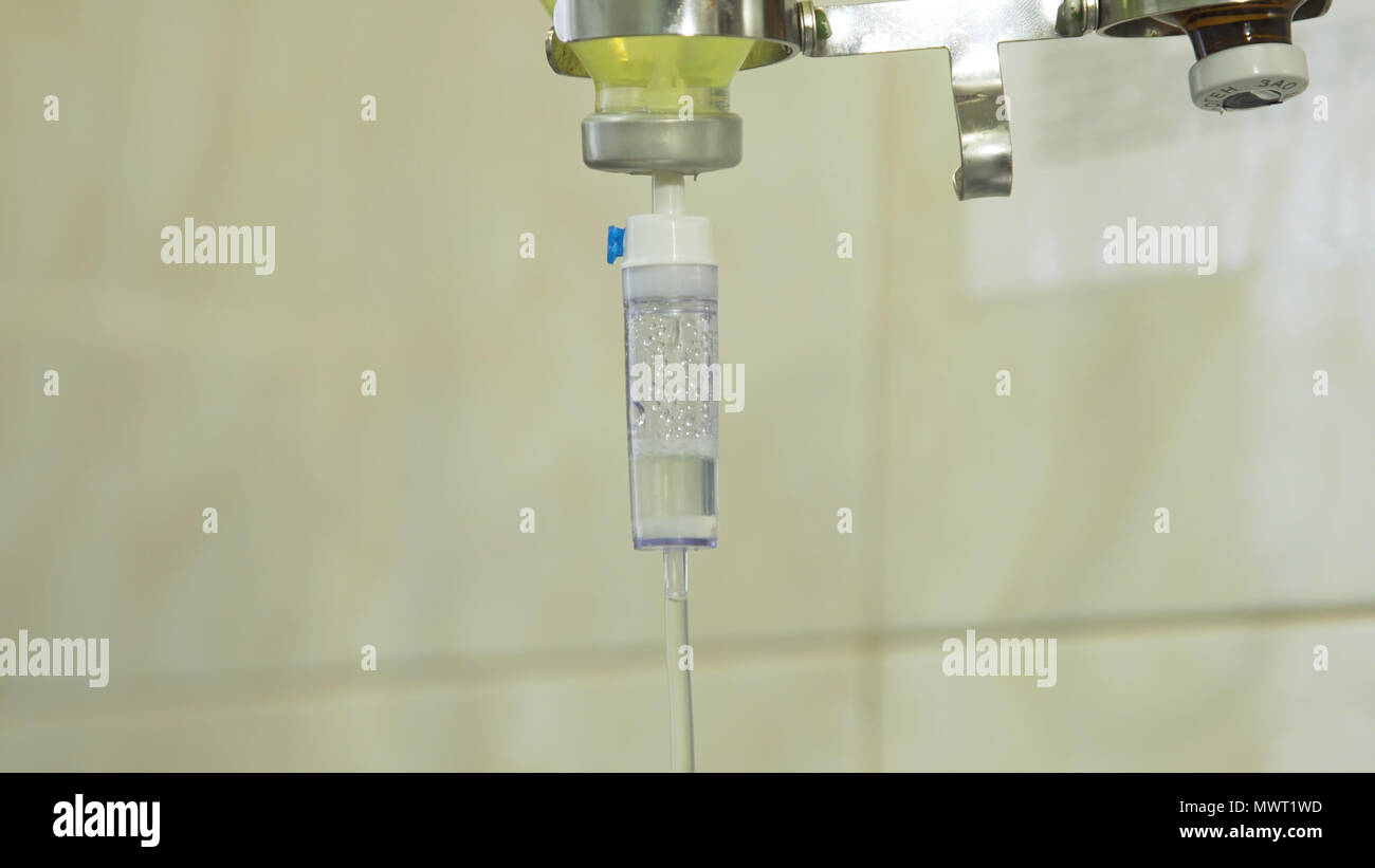 Dropper for intravenous injection. Apparatus and valve control for ...