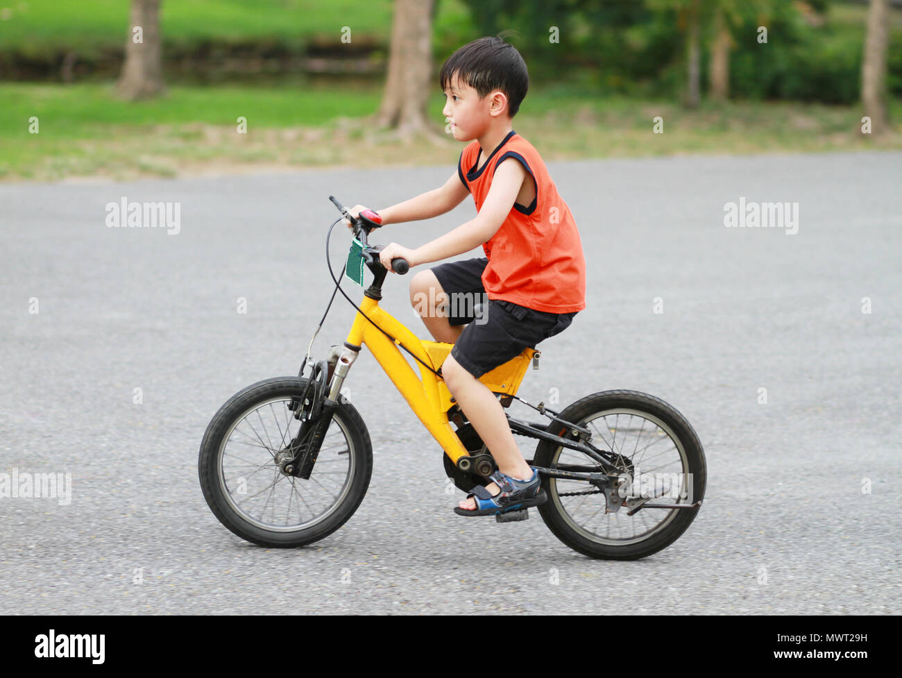 Child helmet bicycle asian hi-res stock photography and images - Alamy