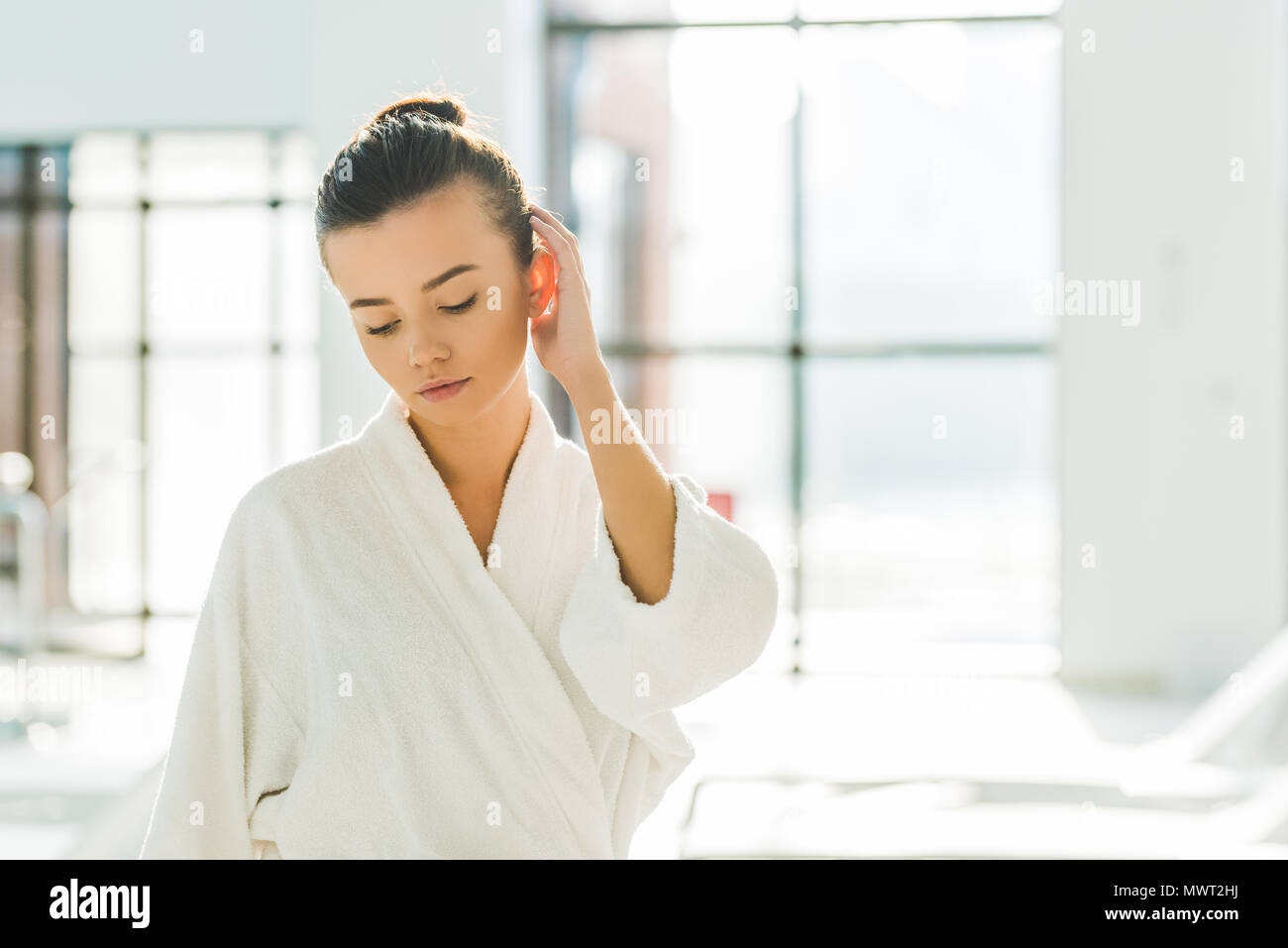 sensual young woman in bathrobe relaxing at spa Stock Photo - Alamy