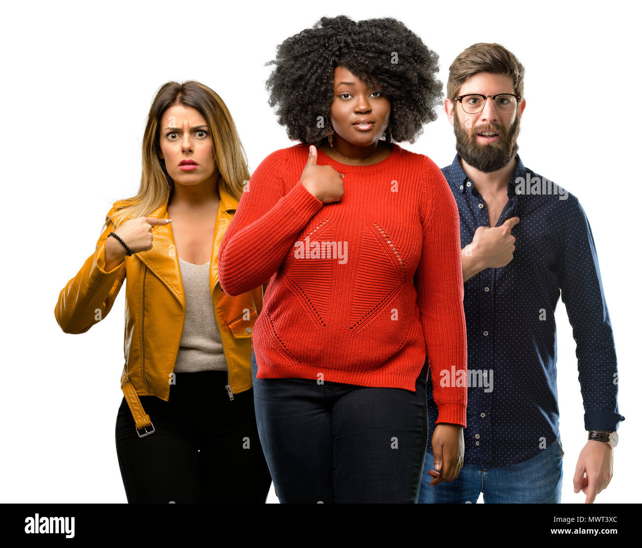 Group of three young men and women happy and surprised cheering ...