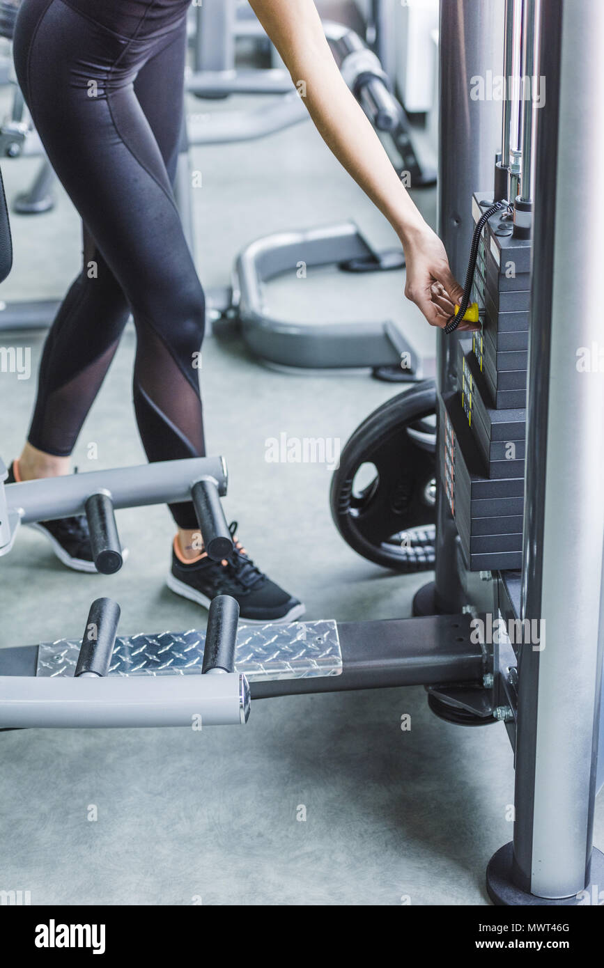 Adding weight hi-res stock photography and images - Alamy