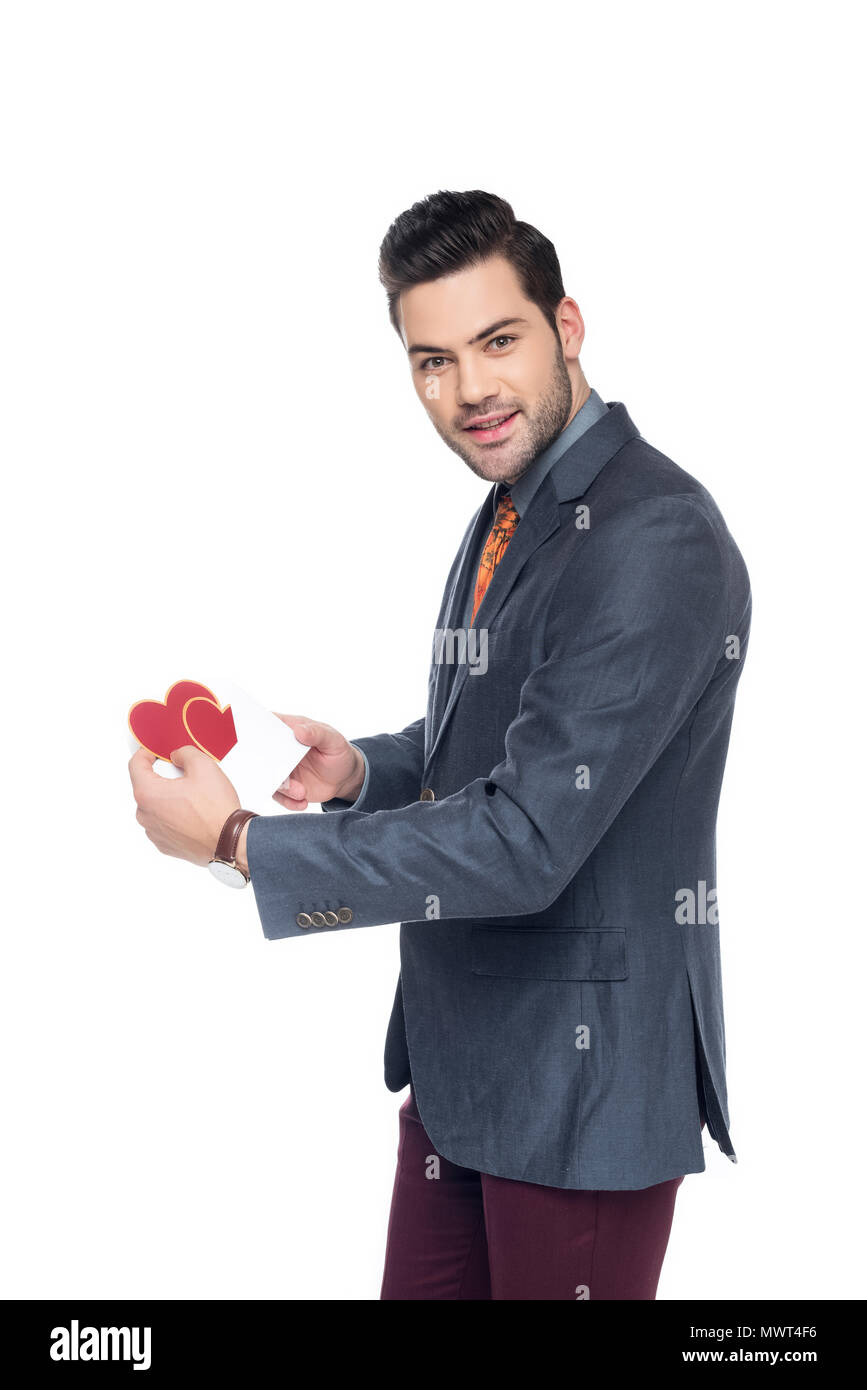 handsome man with valentines greeting card, isolated on white Stock ...
