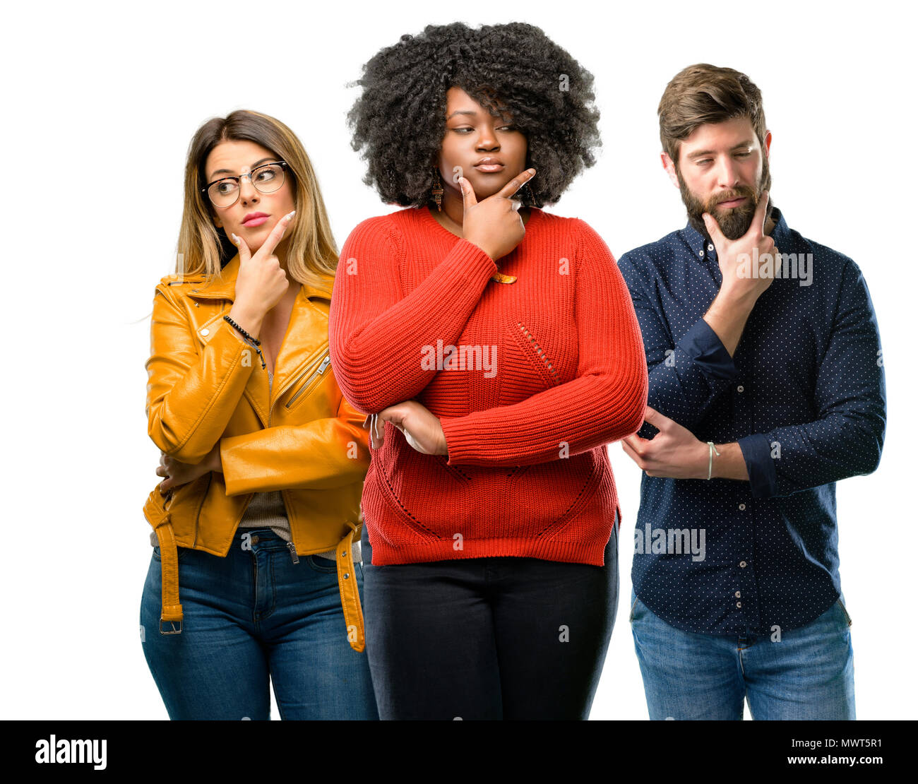 Group of three young men and women doubt expression, confuse and wonder ...