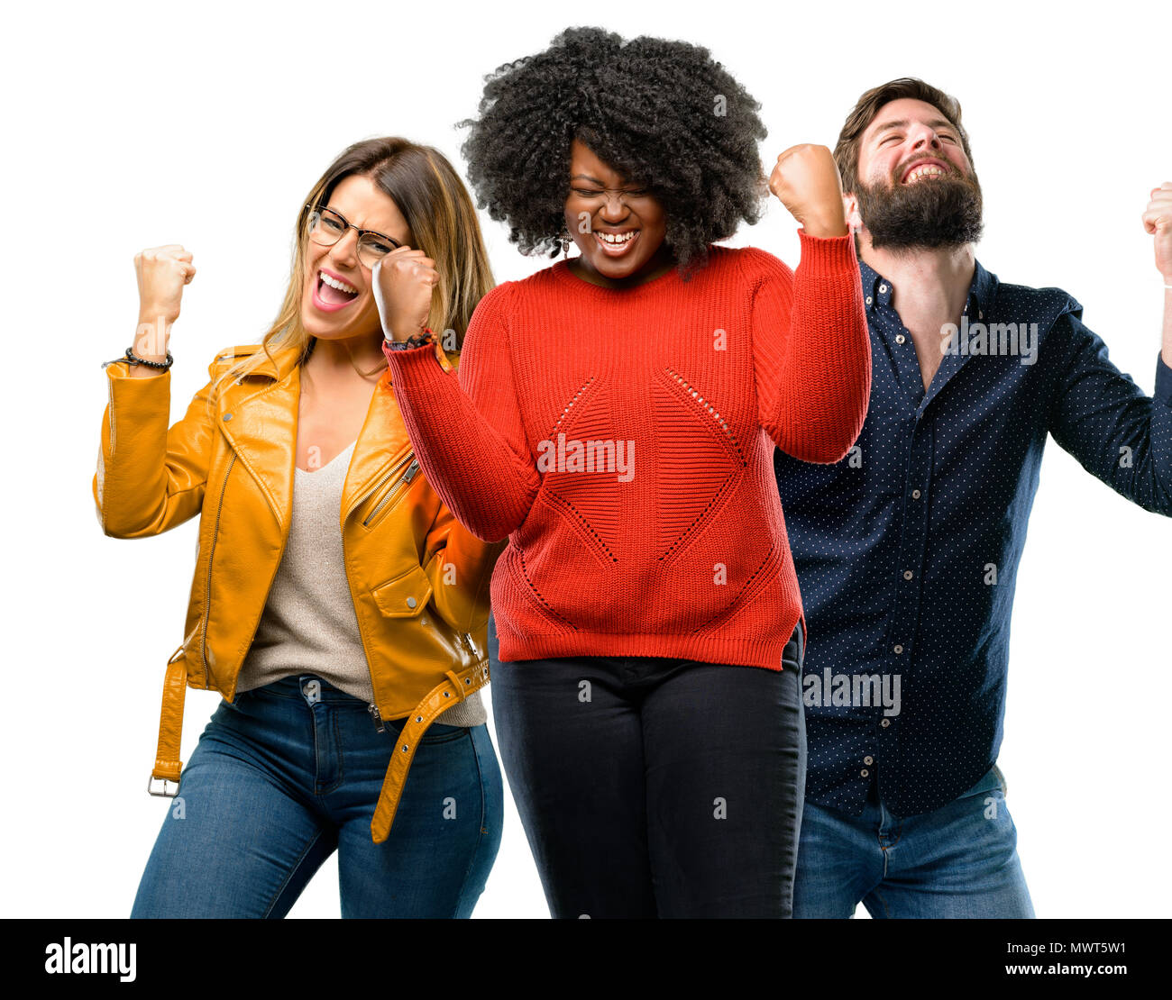 Group of three young men and women happy and excited expressing winning ...