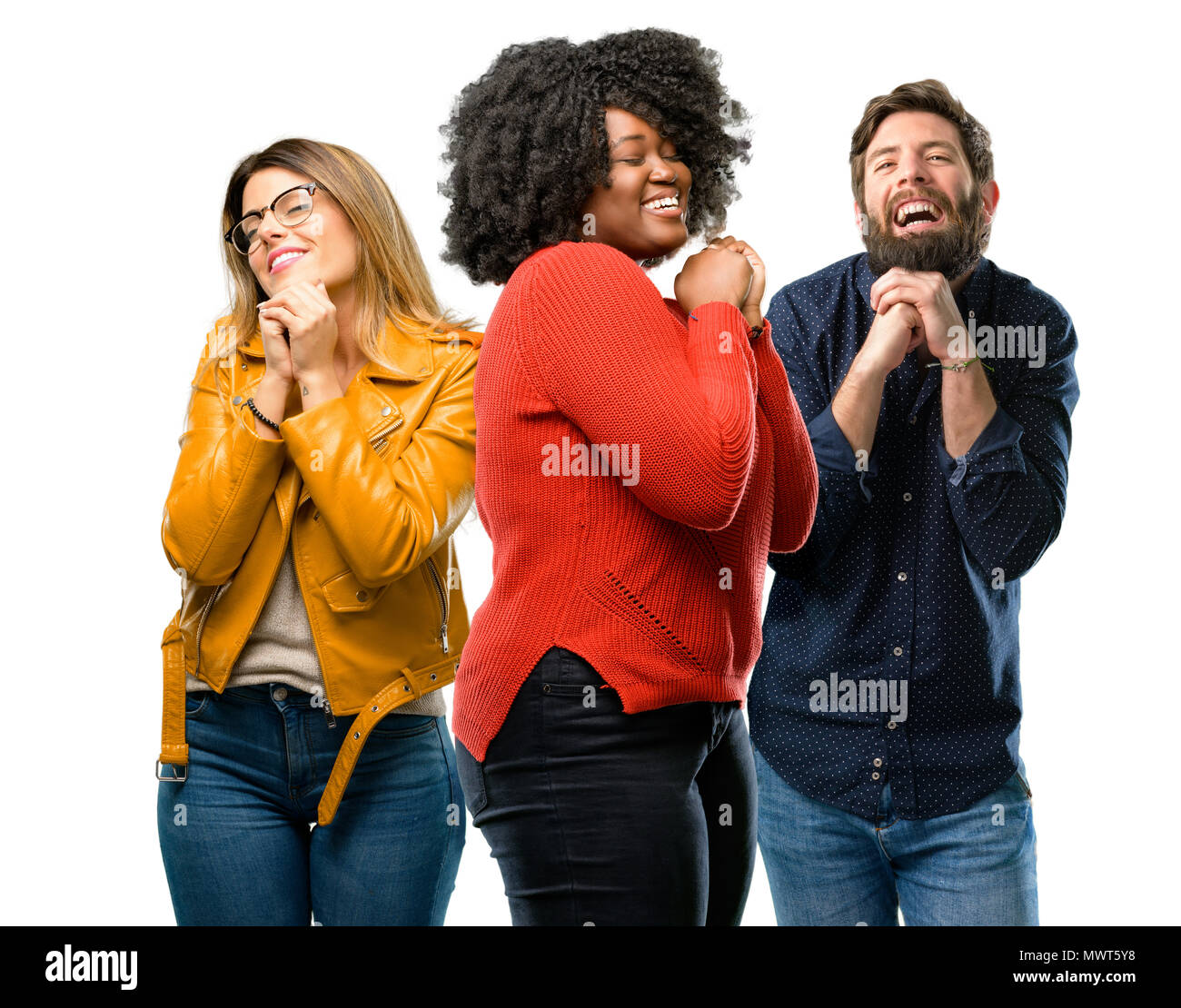 Group of three young men and women confident and happy with a big ...