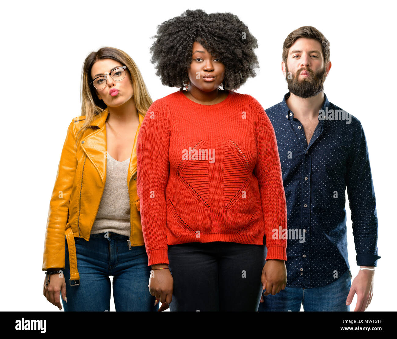 Group of three young men and women expressing love, blows kiss at ...