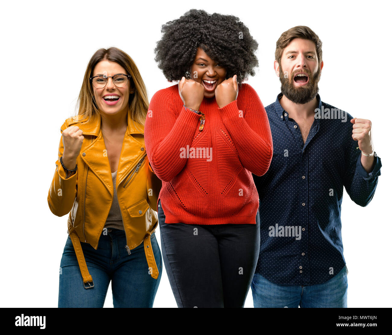 Group of three young men and women happy and excited expressing winning ...