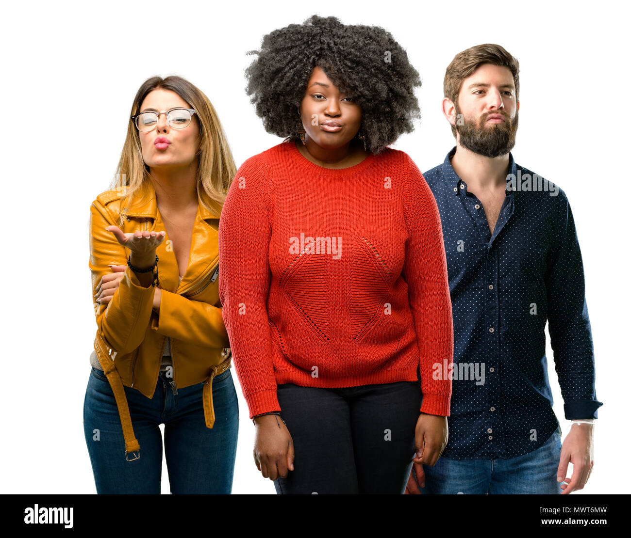 Group of three young men and women expressing love, blows kiss at ...