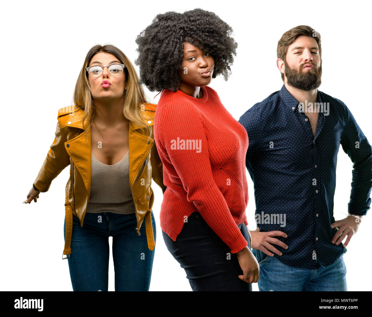 Group of three young men and women expressing love, blows kiss at ...