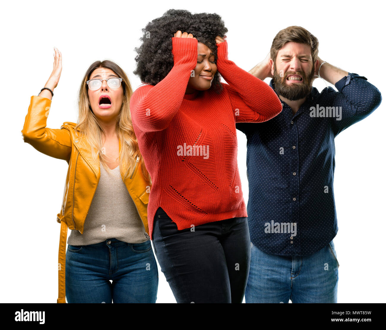 Group of three young men and women terrified and nervous expressing ...