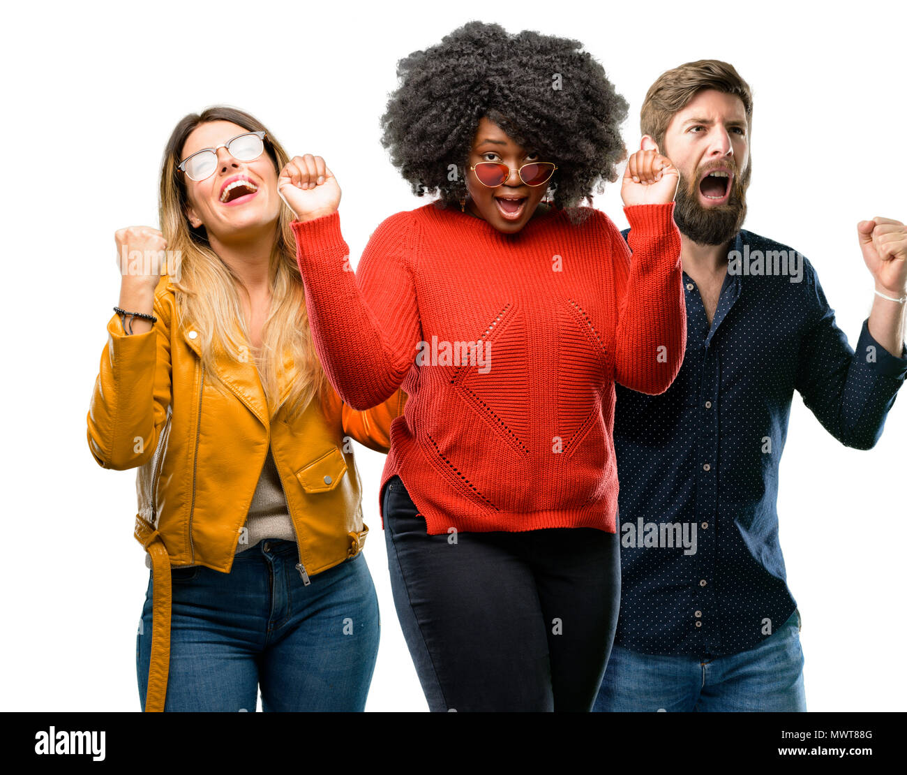 Group of three young men and women happy and excited expressing winning ...